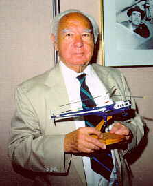 VINER, Dimitry D. (Jimmy), Sikorsky test pilot, with model of S-51 ...